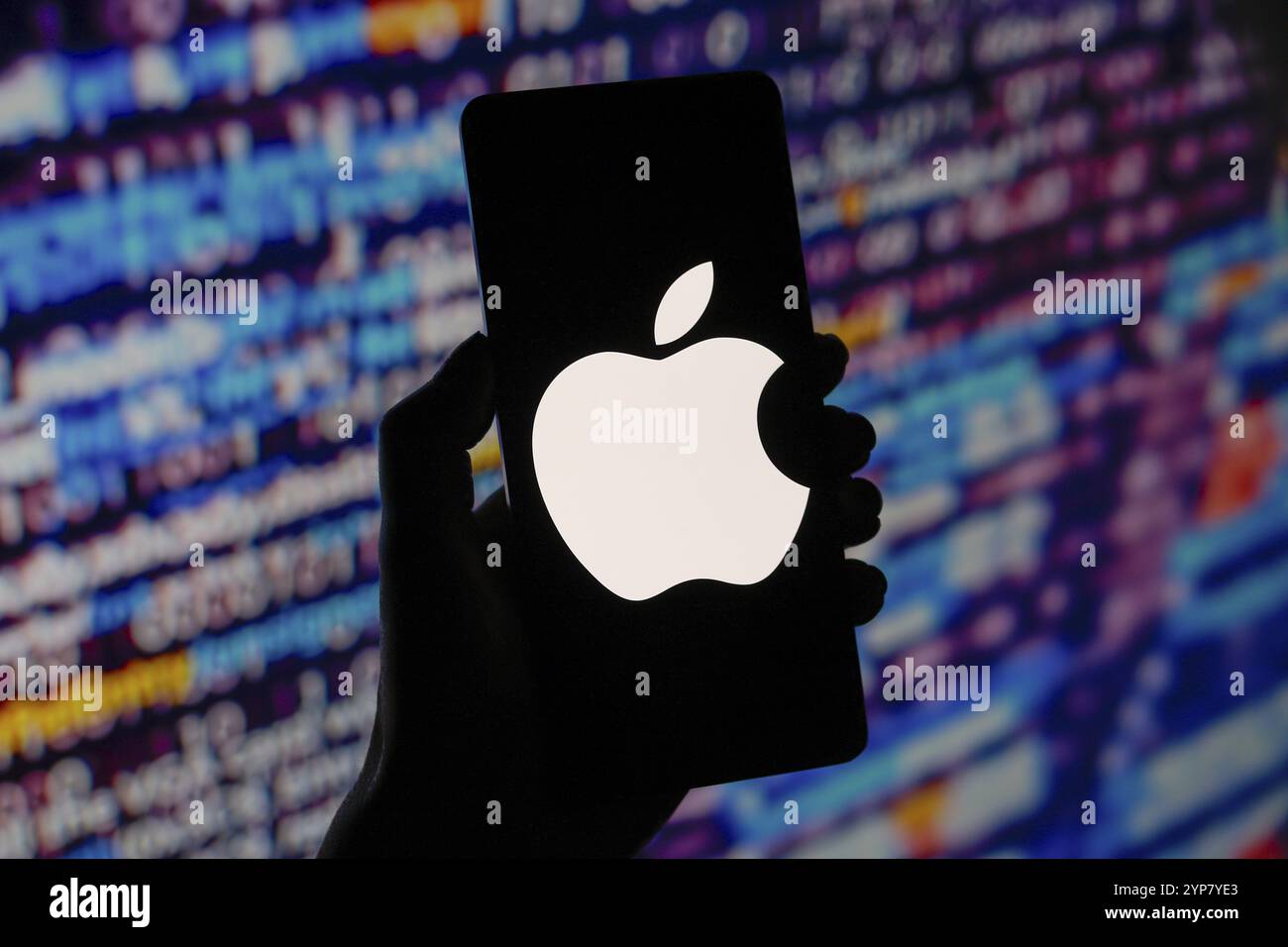 In this photo illustration, the Apple logo is displayed on a smartphone ...