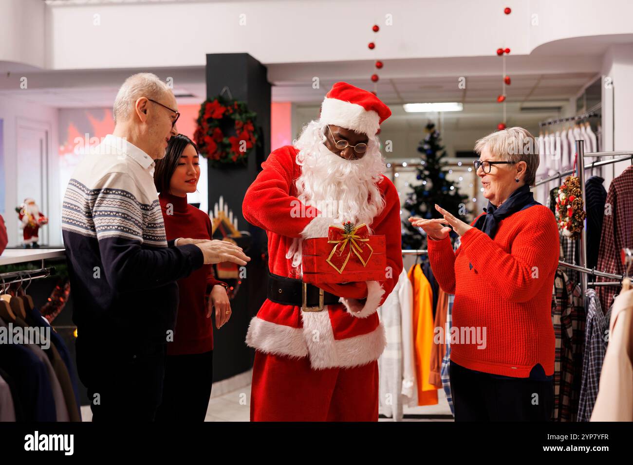 Worker drawing raffle winners names in shop, presenting participants ...