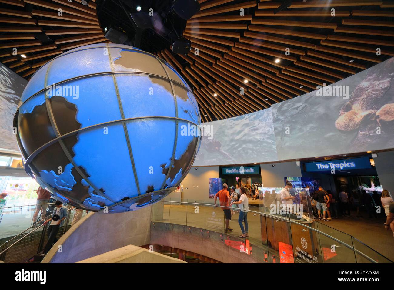 The front entrance lobby features a huge, 3D blue globe of the world ...
