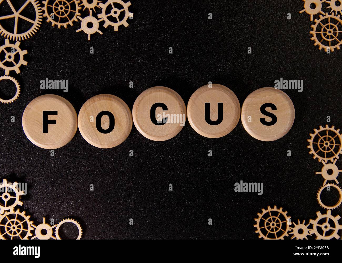 Wooden blocks display the word focus in vibrant red, set against a ...