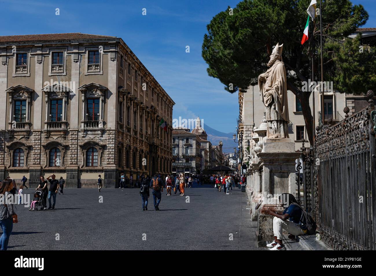 Piazza Duomo looking along Via Etnea towards mount Etna in the distance ...