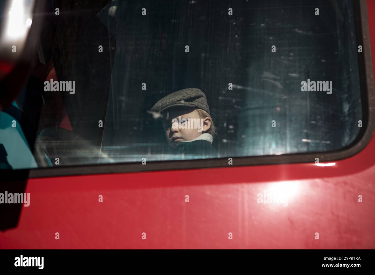 A Cute little boy driving is fathers truck with Dad Stock Photo - Alamy