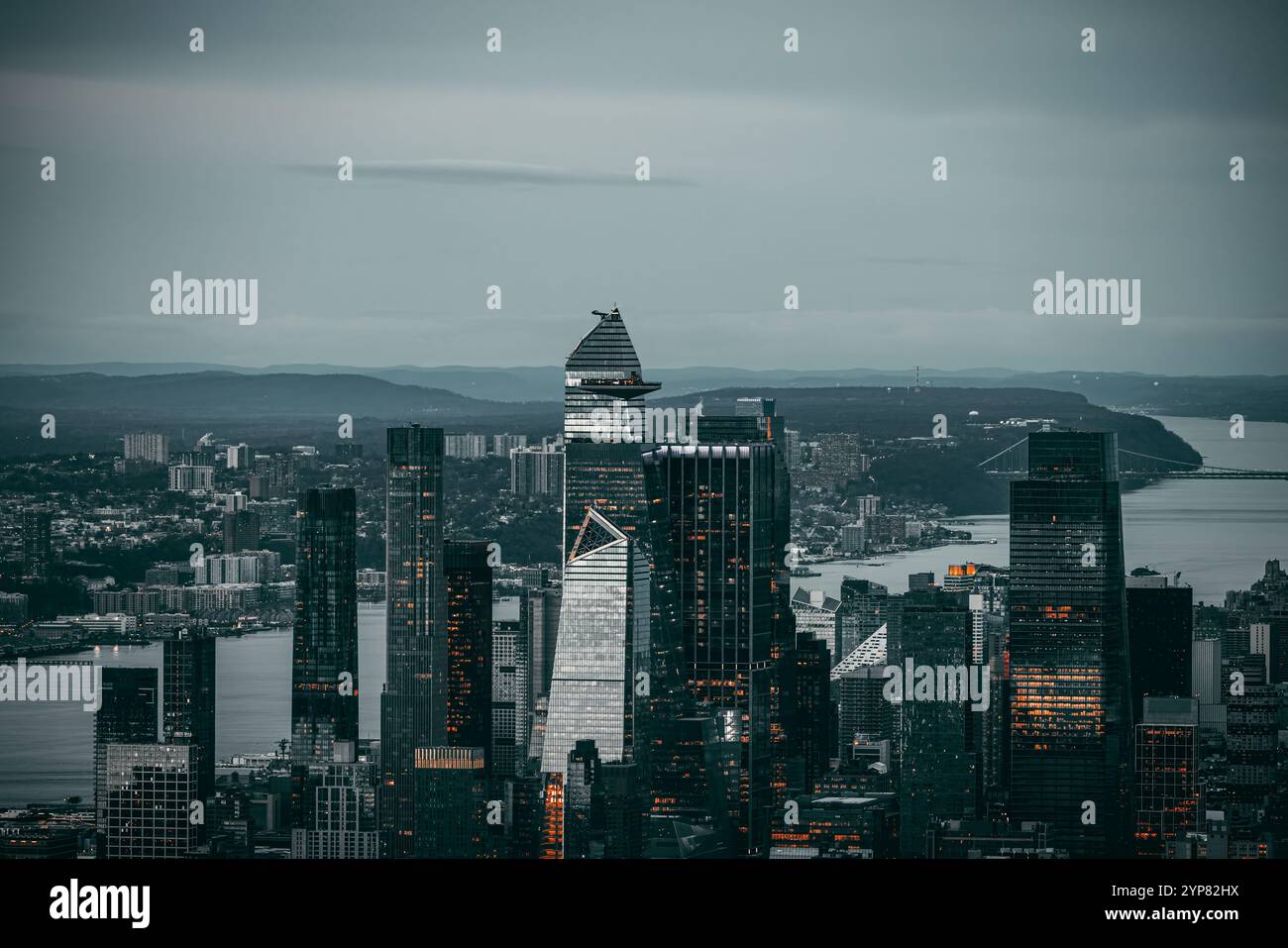 A dramatic view of New York City’s Hudson Yards skyline at twilight ...