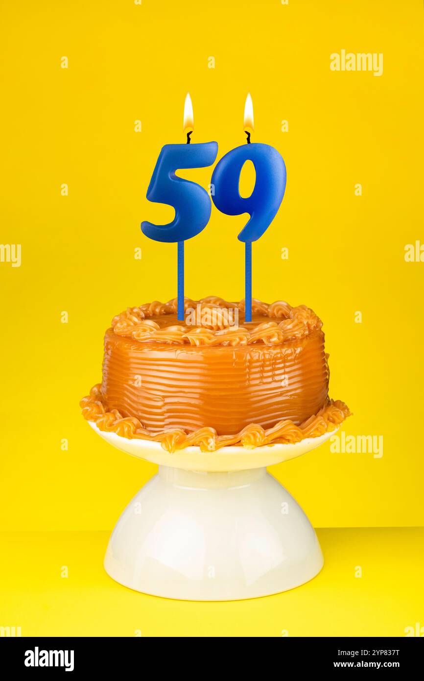 Happy birthday cake with number 59 candle - Card on a yellow background ...