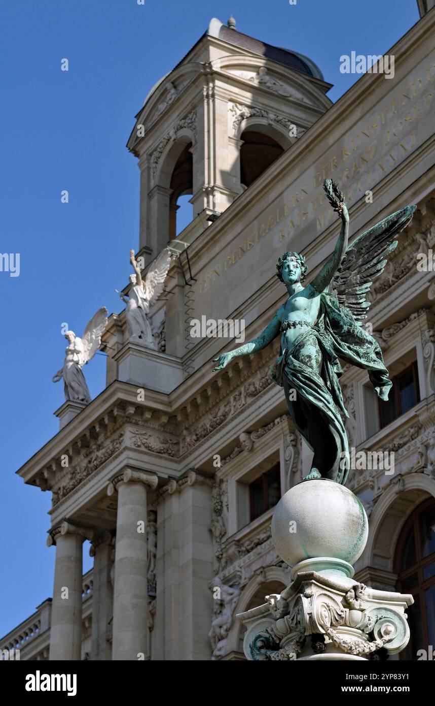 A statue stands near the ornate exterior of the Kunsthistorisches ...