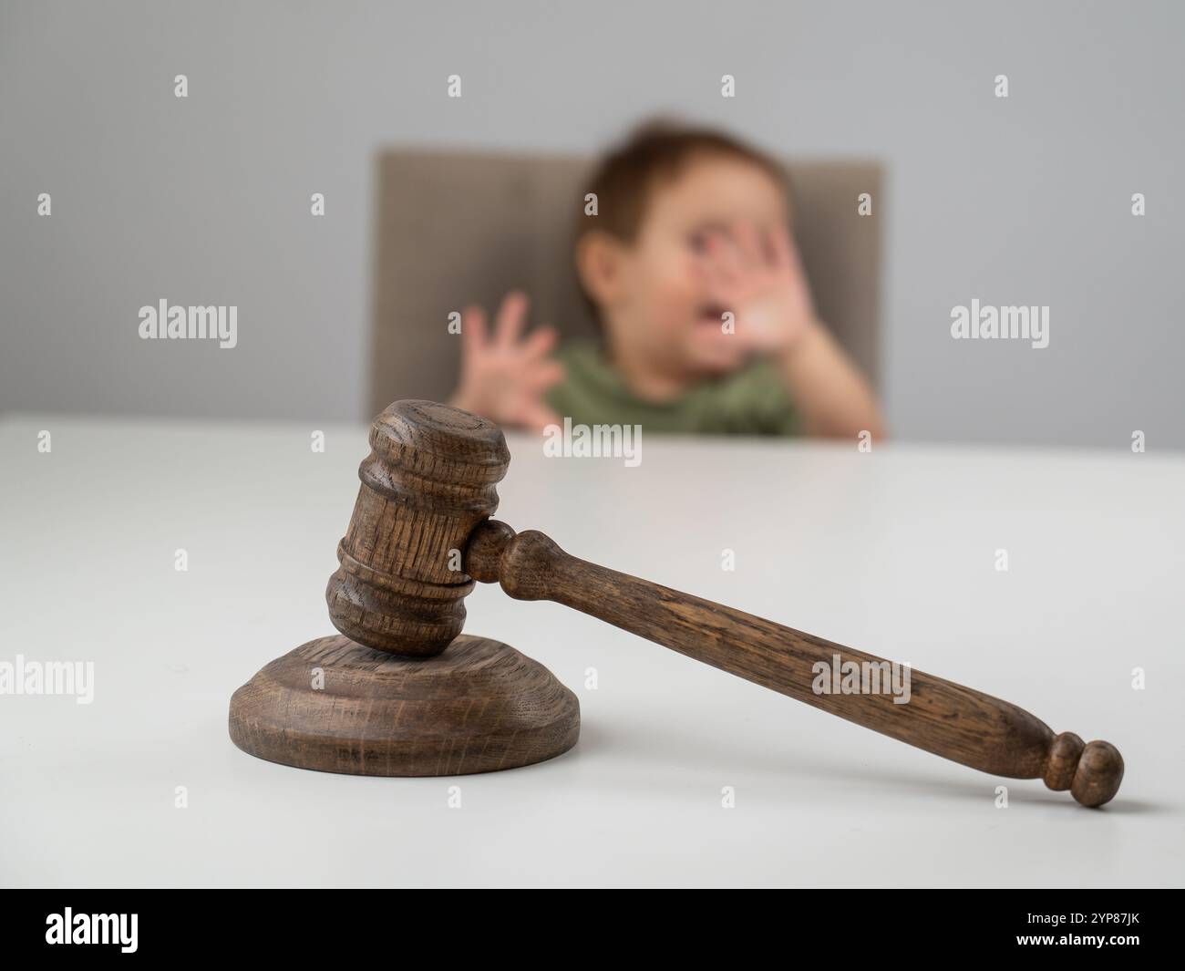 Little boy behind judge's gavel Stock Photo - Alamy