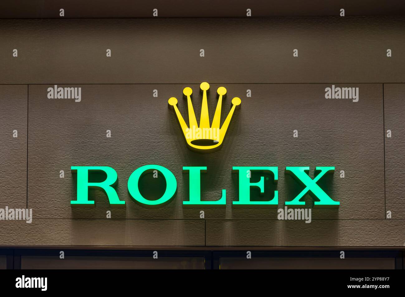 London, UK - November 22, 2024. Glowing neon sign on a shop selling ...