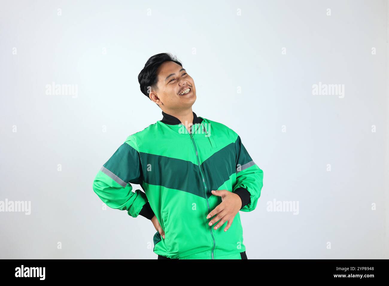 Adult Asian Indonesian Man Wearing Gojek Uniform Touching his Belly ...