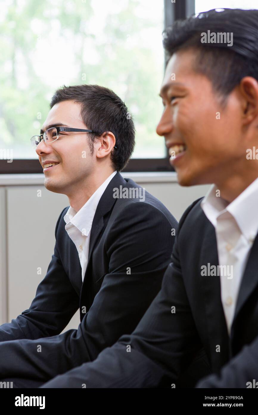Business people sitting in a row hi-res stock photography and images ...
