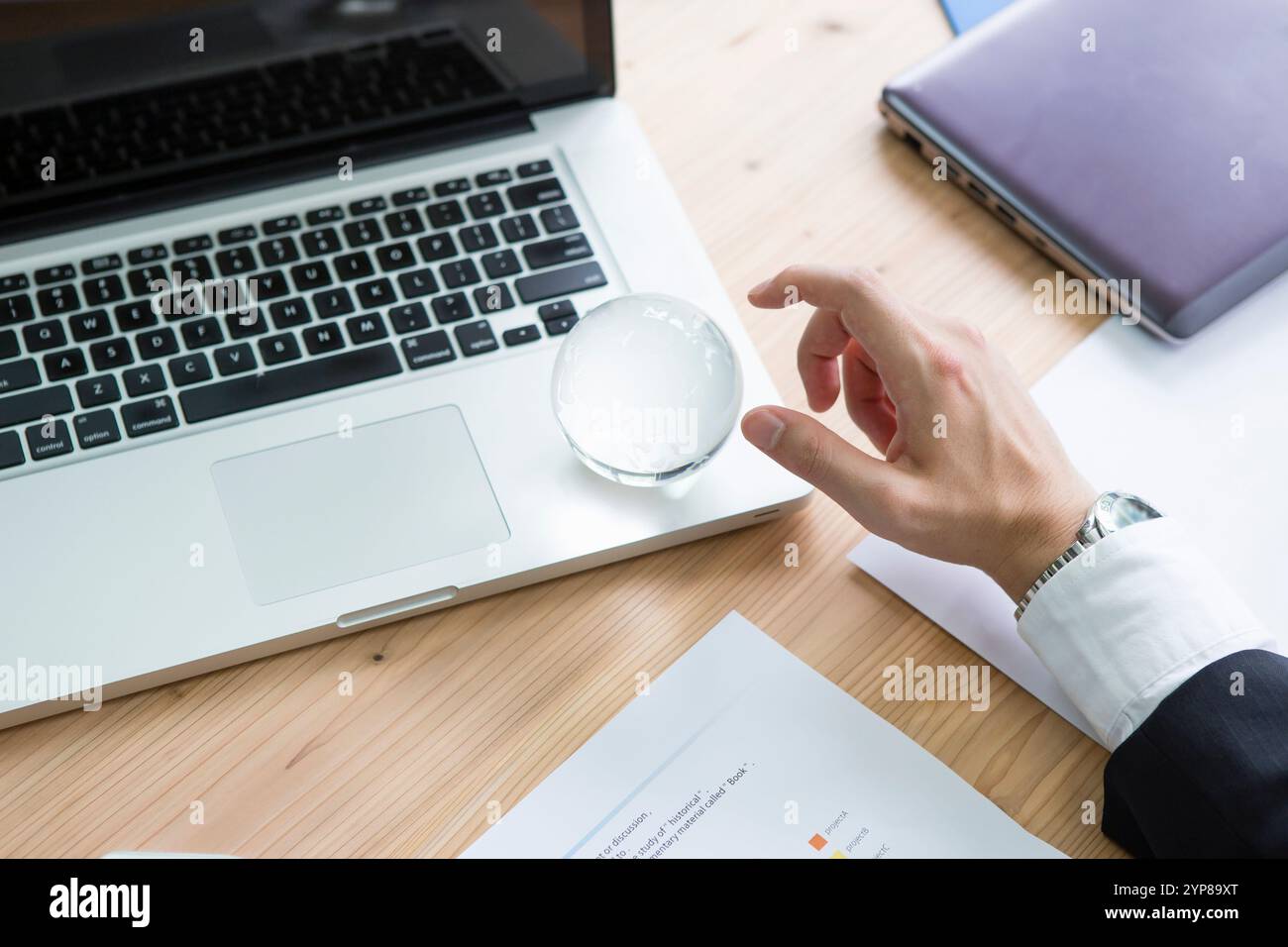 Computer and glass globe Stock Photo - Alamy