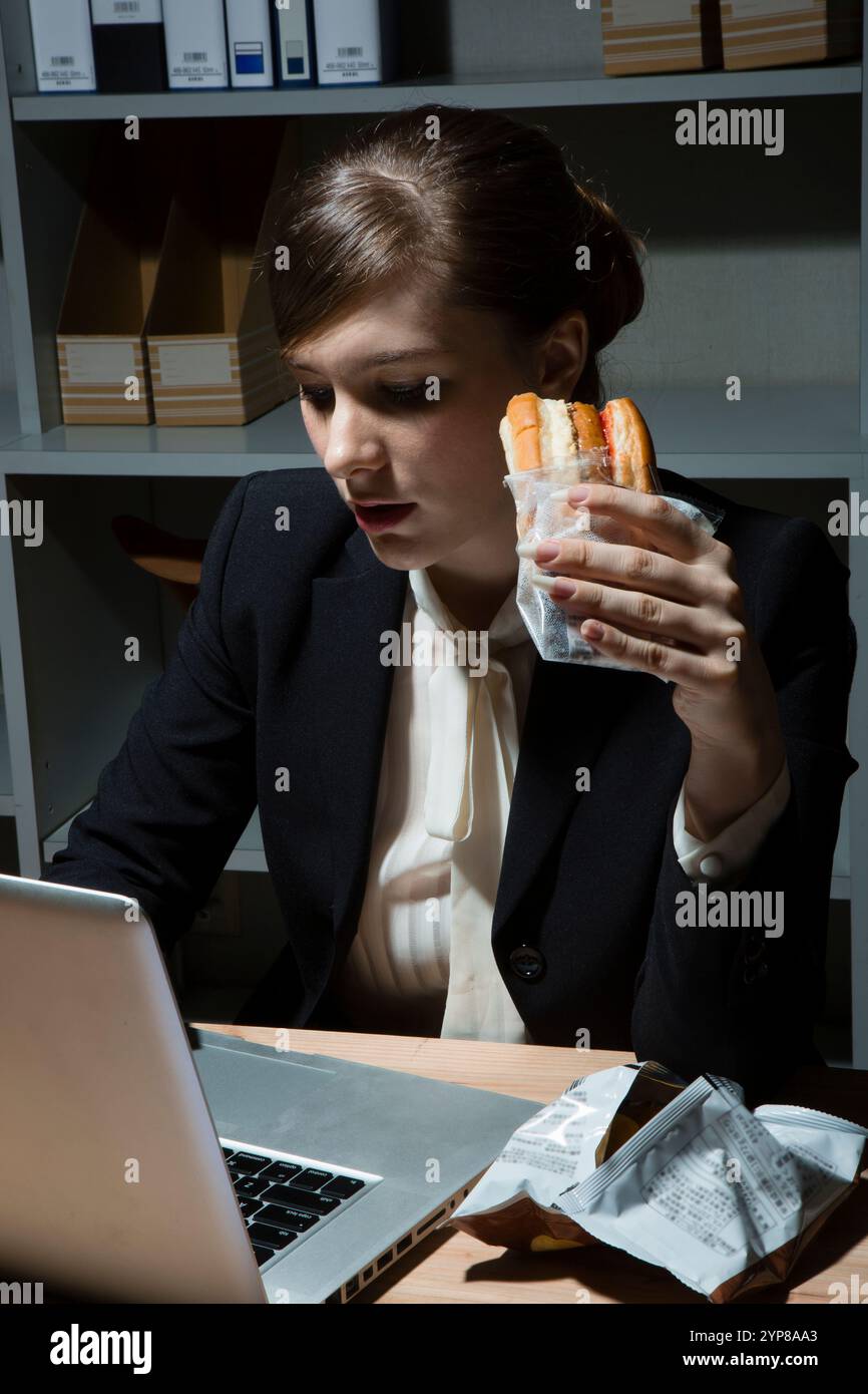 Eating at work stress hi-res stock photography and images - Alamy