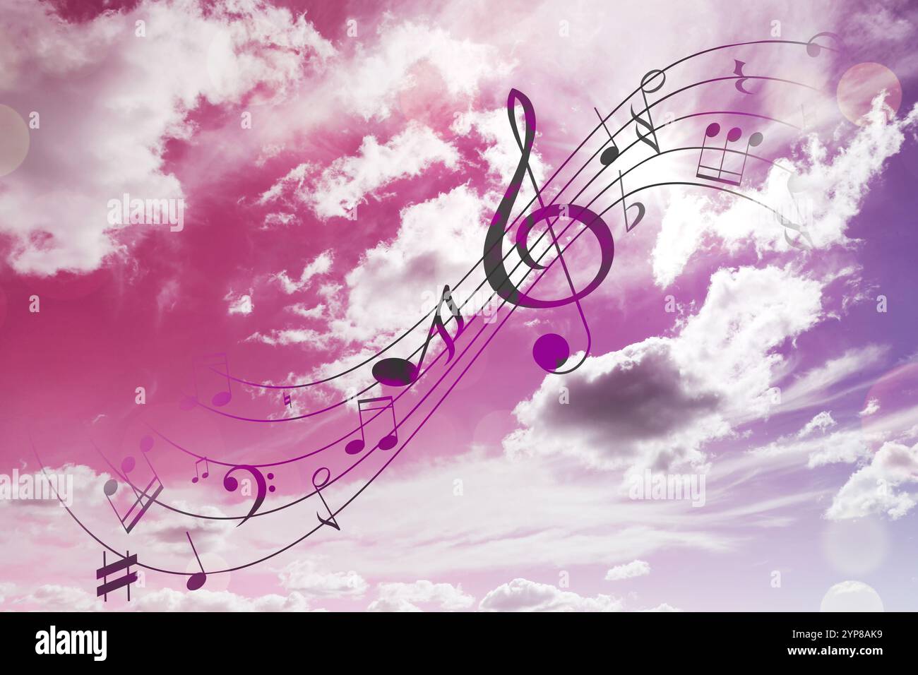 Musical symbols in beautiful sky with clouds, color toned Stock Photo ...