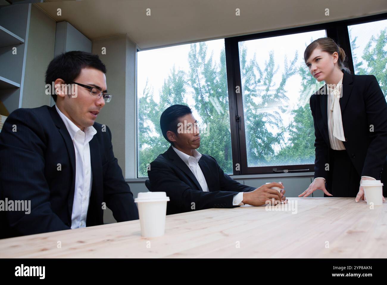 Business people arguing with each other Stock Photo - Alamy