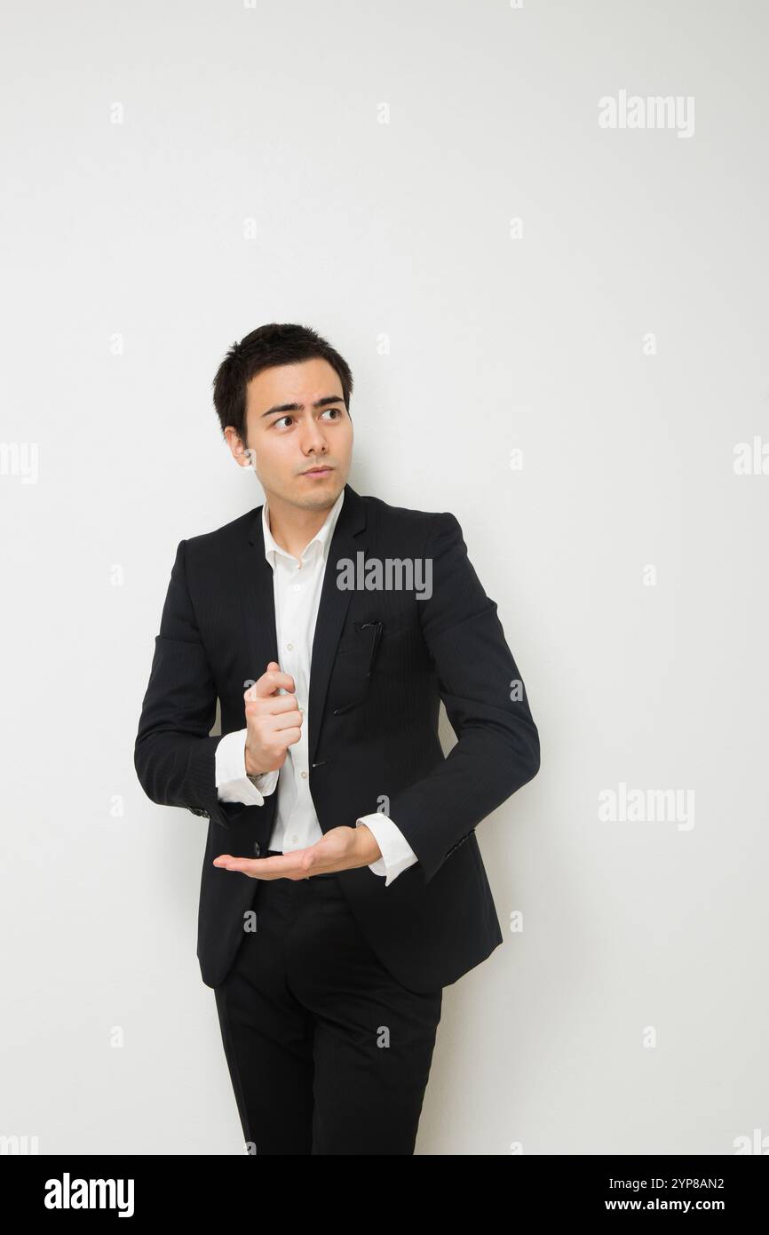 Businessman in an inspirational pose Stock Photo - Alamy