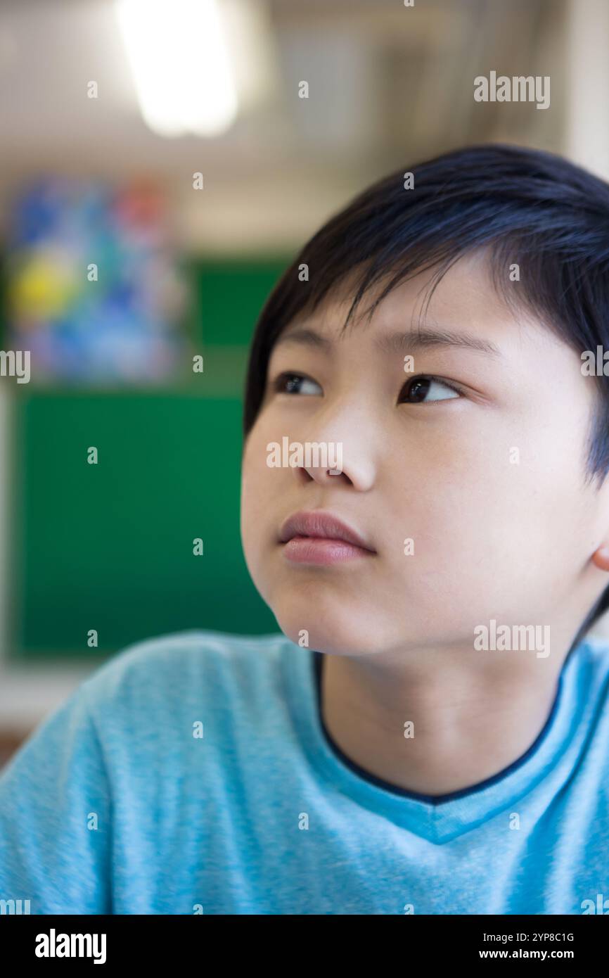 Boys studying in the classroom Stock Photo - Alamy