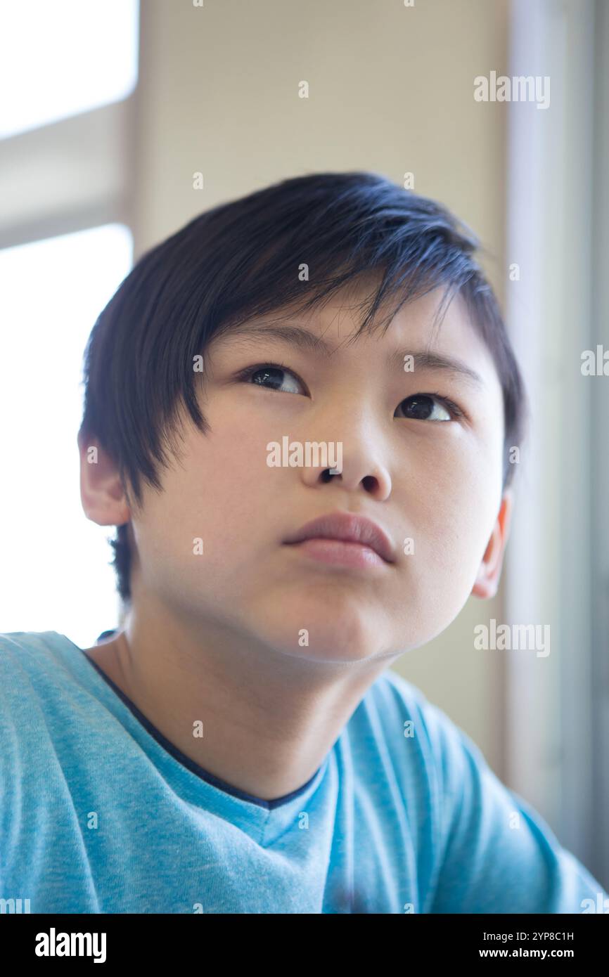 Boys studying in the classroom Stock Photo - Alamy