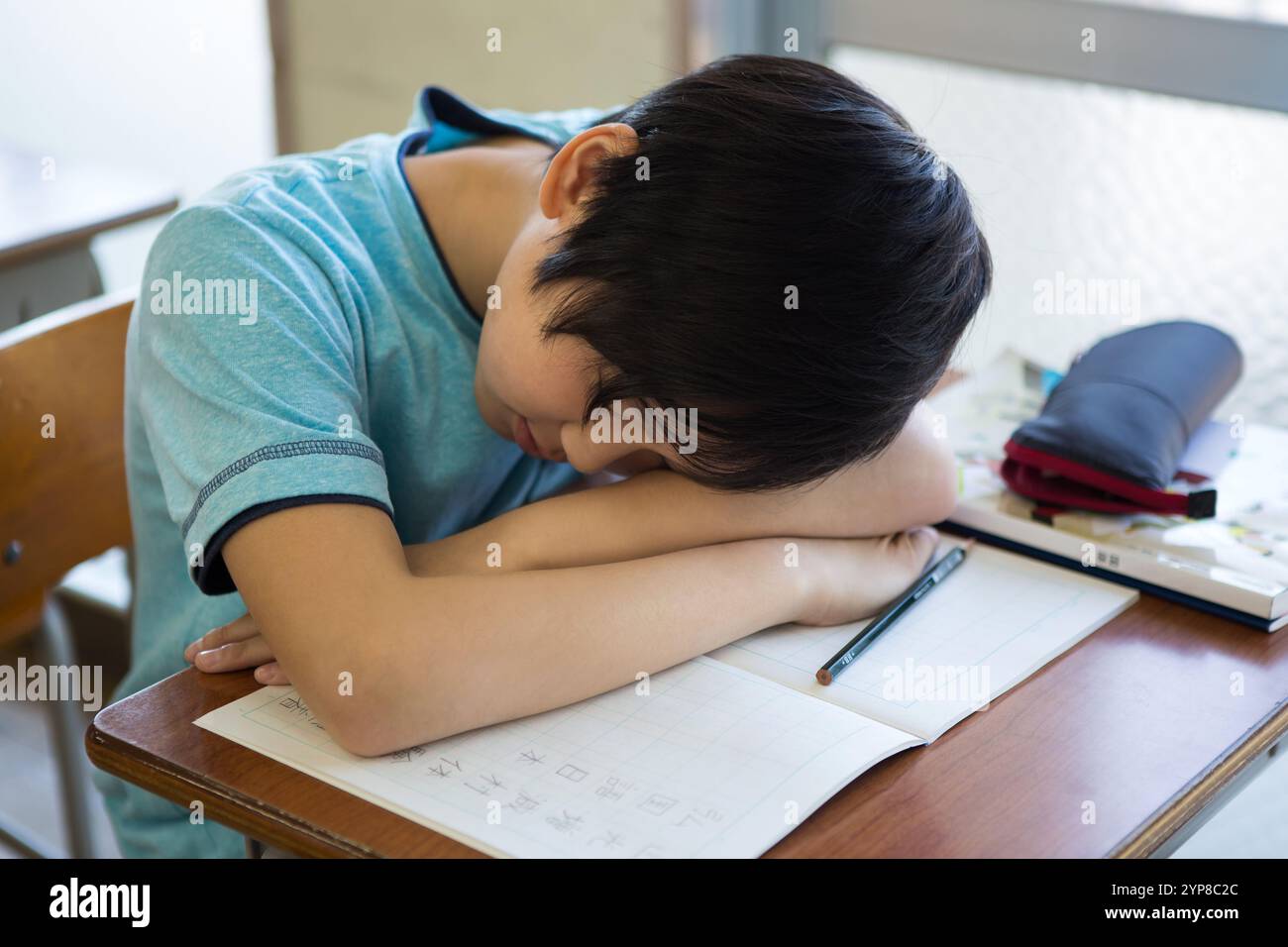 Child staying late hi-res stock photography and images - Alamy