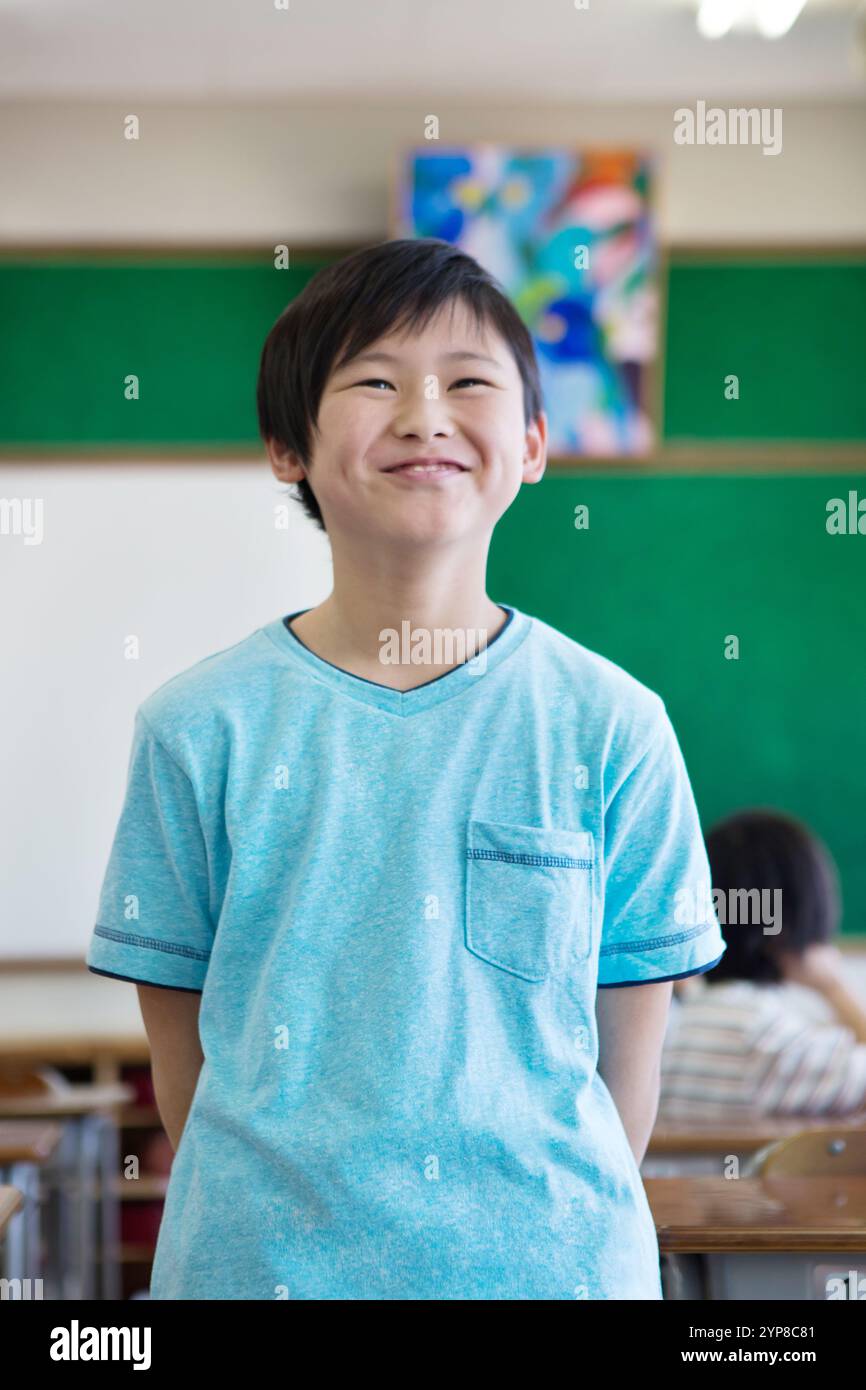 Primary school pupil in classroom Stock Photo - Alamy