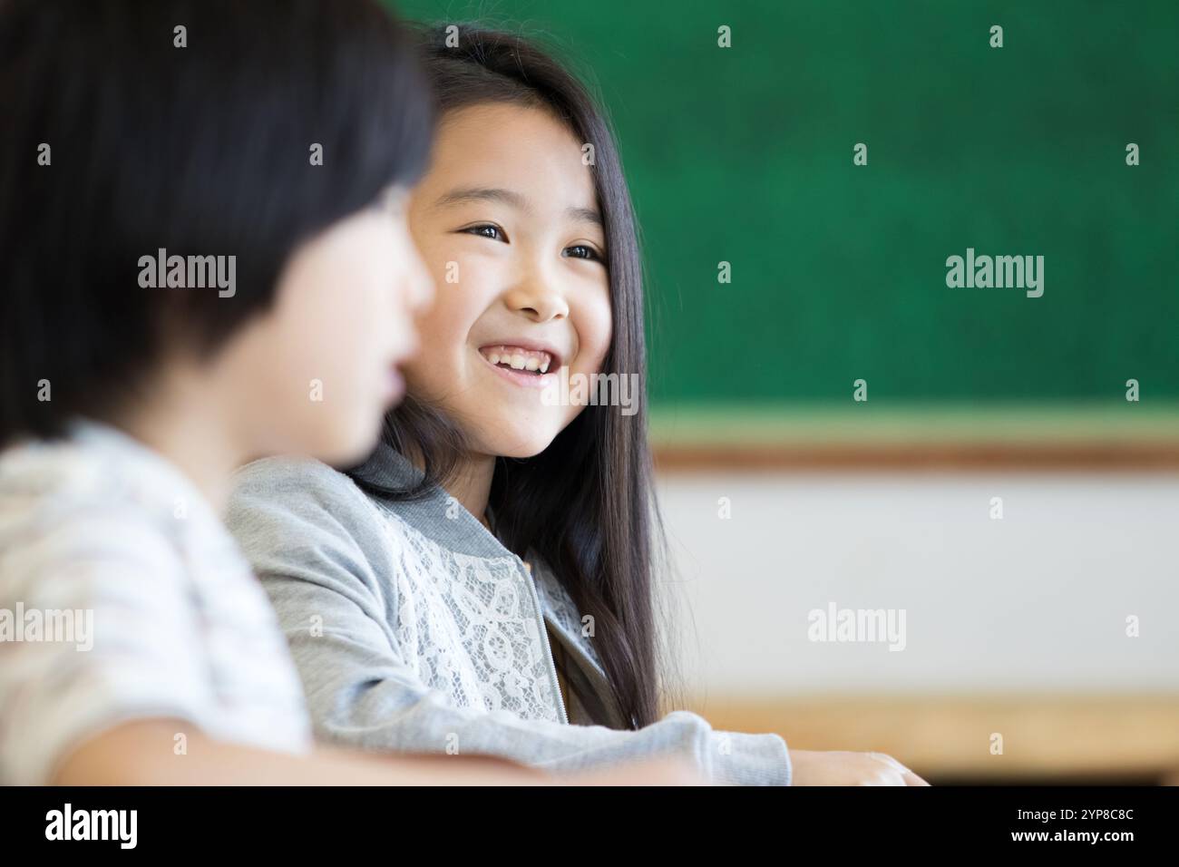 Primary school pupil in classroom Stock Photo - Alamy