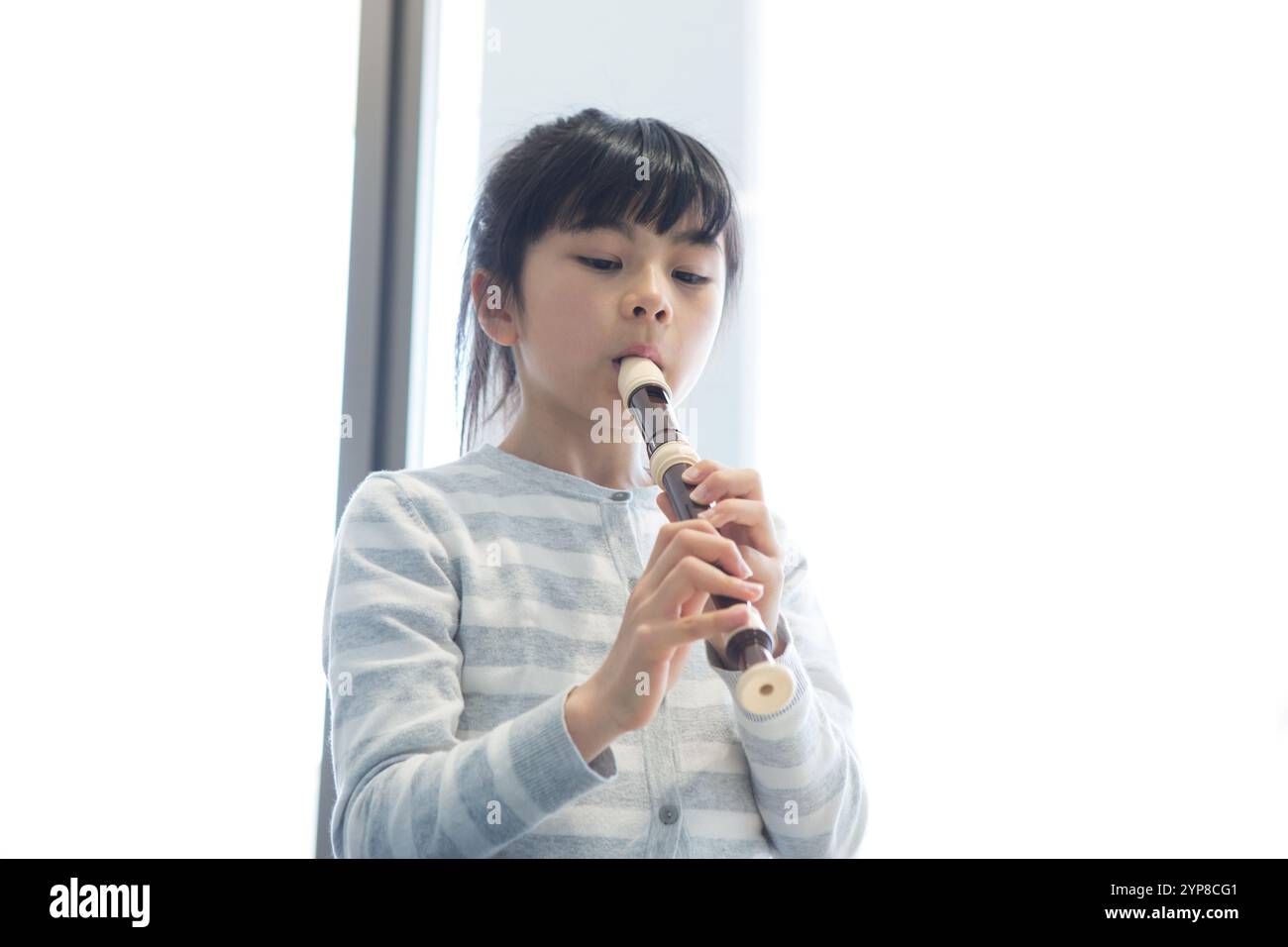 Primary school children taking music lessons Stock Photo - Alamy