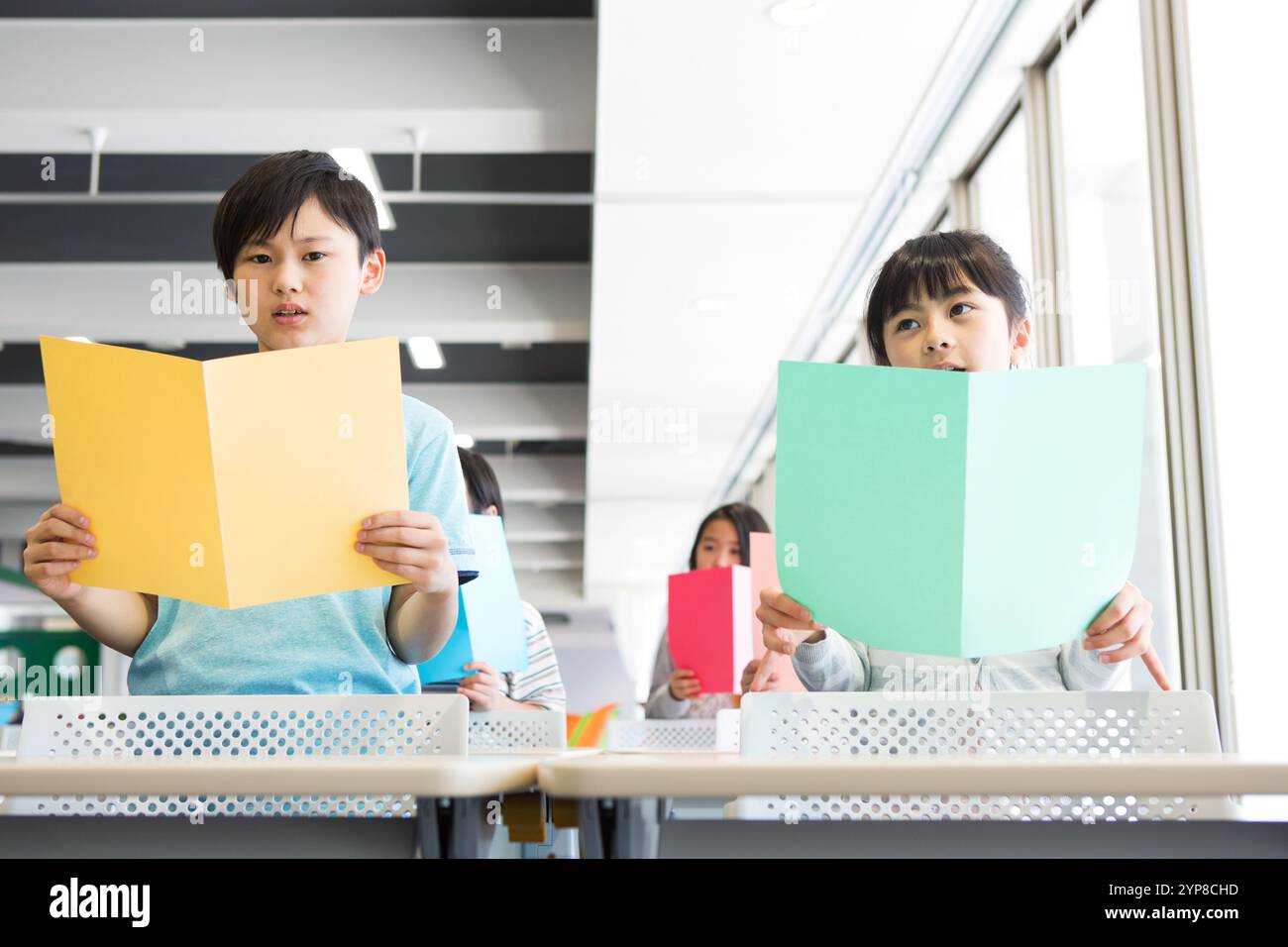 Primary school children taking music lessons Stock Photo - Alamy