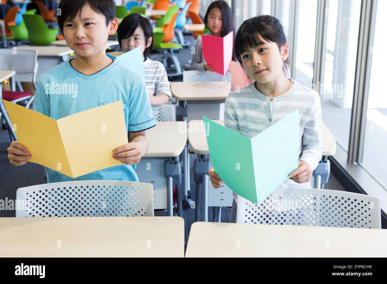 Primary school children taking music lessons Stock Photo - Alamy