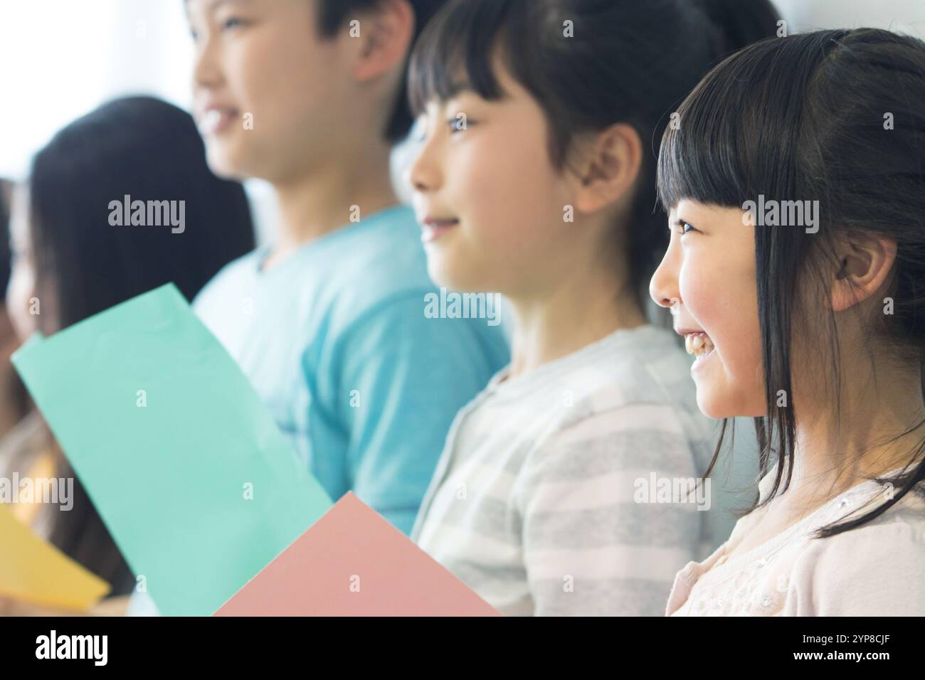 Primary school children taking music lessons Stock Photo - Alamy