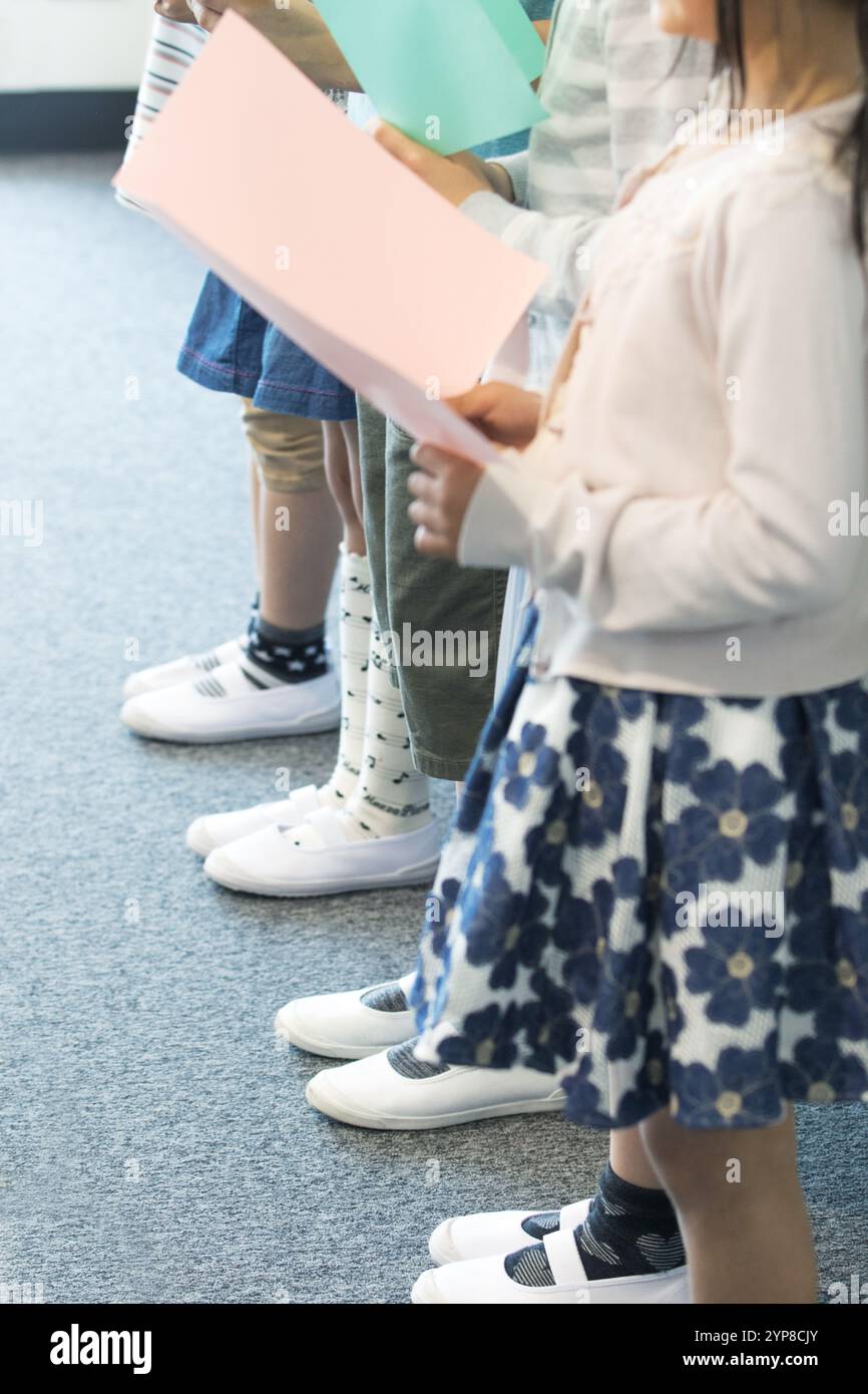 Primary school children taking music lessons Stock Photo - Alamy