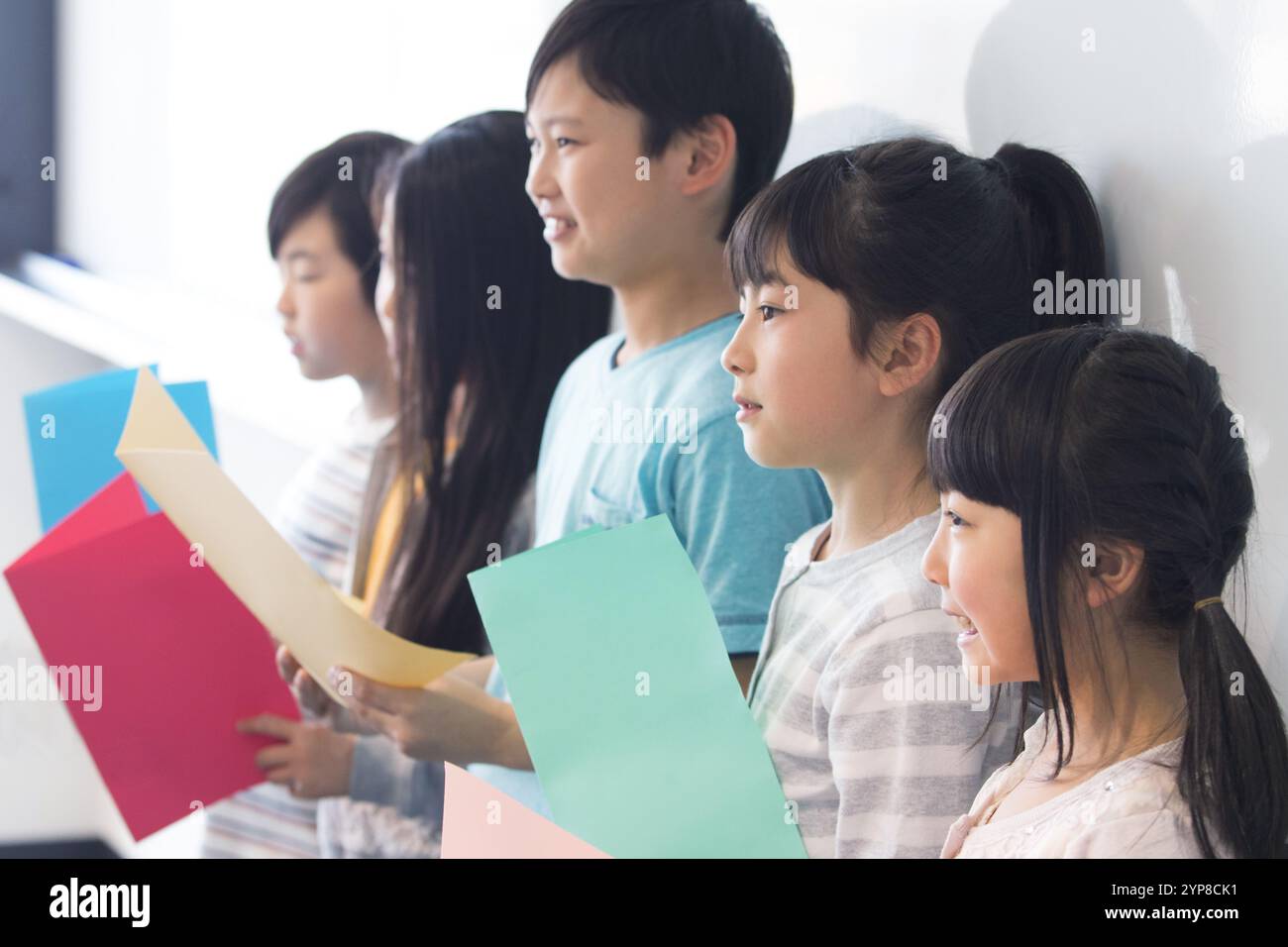 Primary school children taking music lessons Stock Photo - Alamy