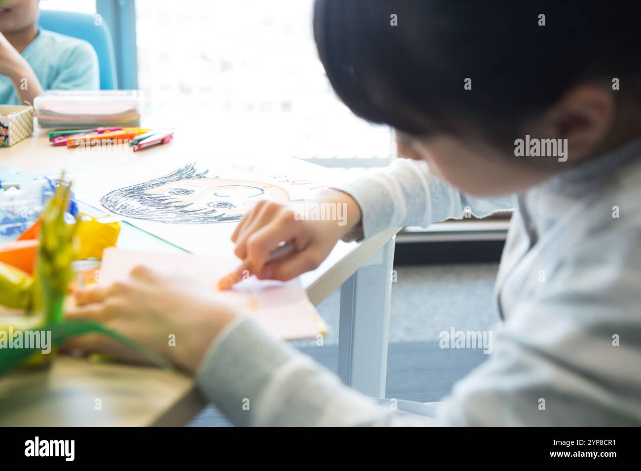 Primary school children doing arts and crafts Stock Photo - Alamy