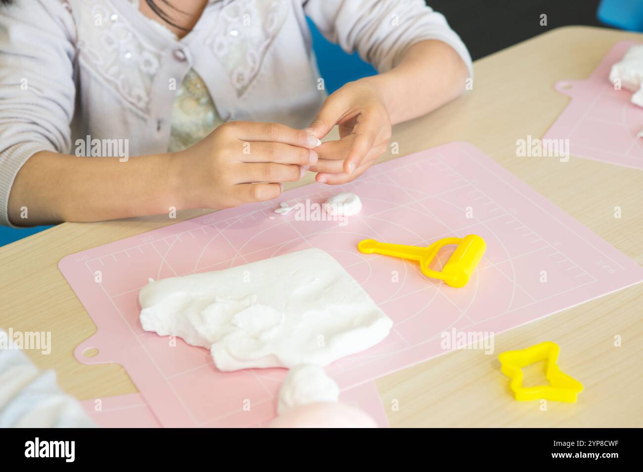Primary school children doing arts and crafts Stock Photo - Alamy