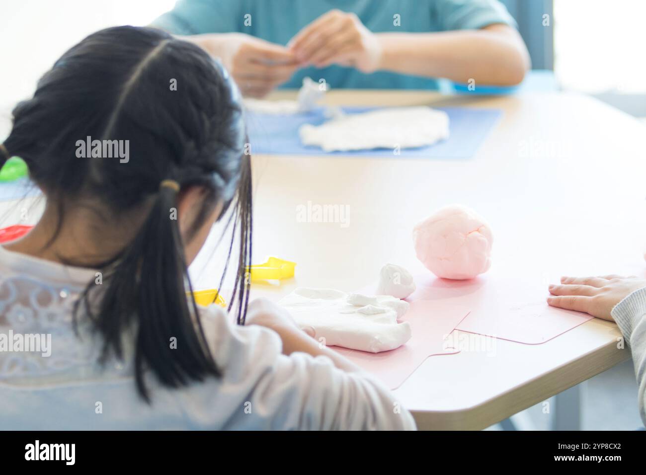 Primary school children doing arts and crafts Stock Photo - Alamy