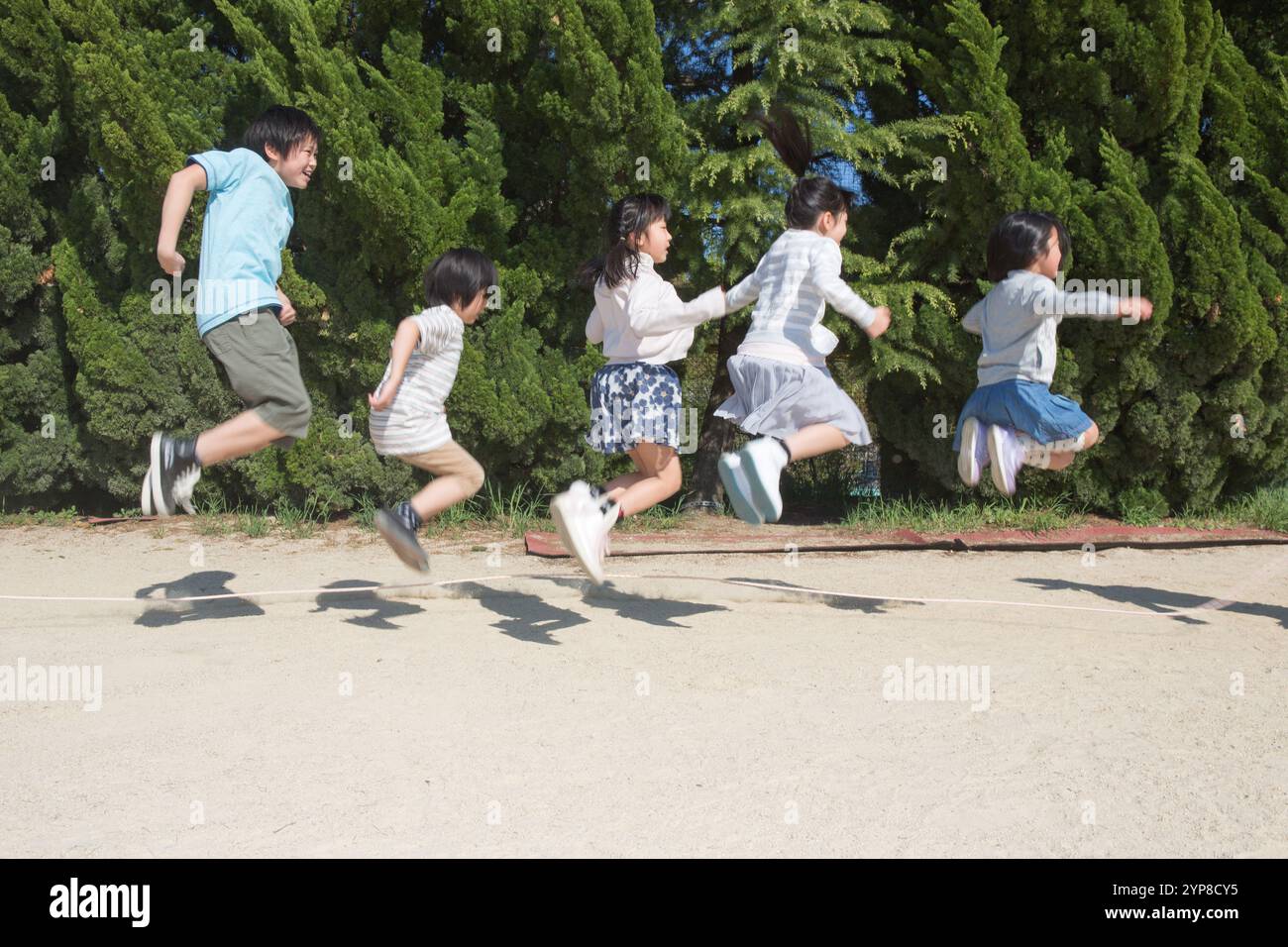 Child jumping japanese hi-res stock photography and images - Alamy