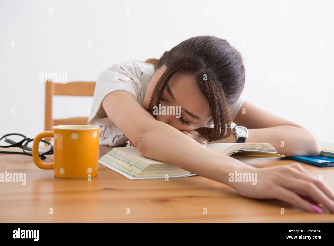 Dozing with book hi-res stock photography and images - Alamy