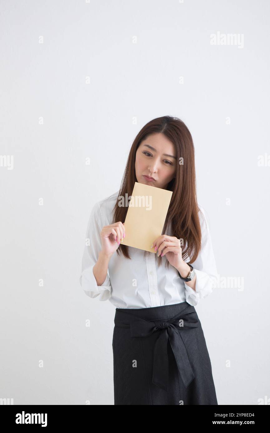 Woman receiving paycheck hi-res stock photography and images - Alamy