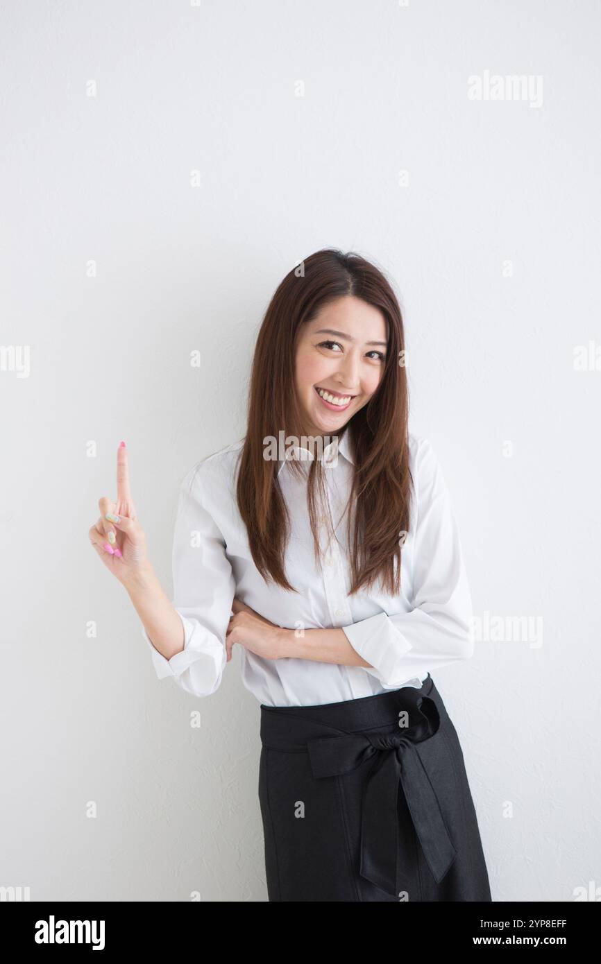 Office worker standing Stock Photo - Alamy