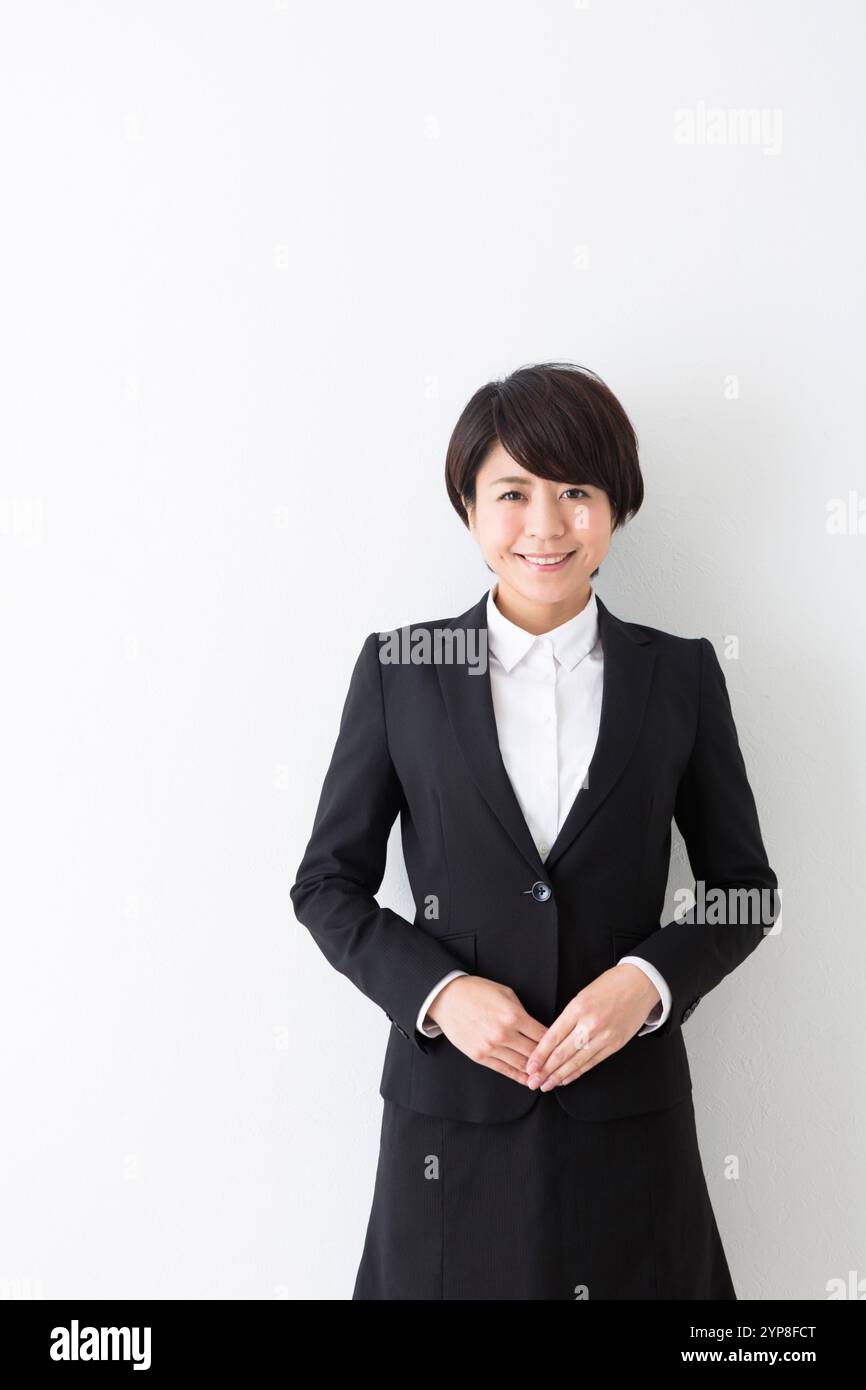 Standing with a smile hi-res stock photography and images - Alamy