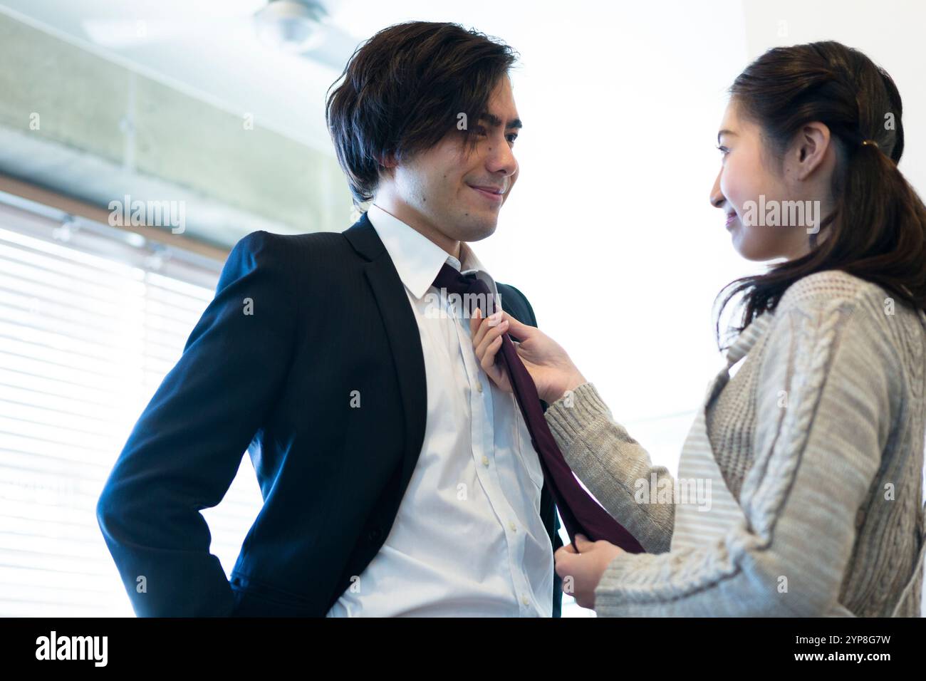 Couple getting ready work hi-res stock photography and images - Alamy