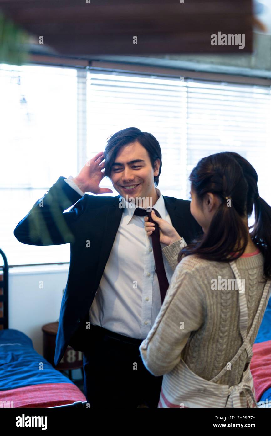 Couple getting ready work hi-res stock photography and images - Alamy