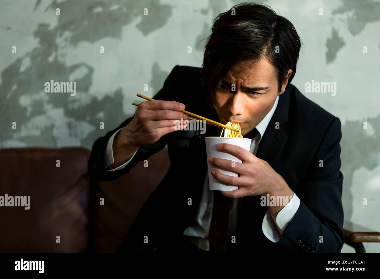 Person eating instant noodle hi-res stock photography and images - Alamy