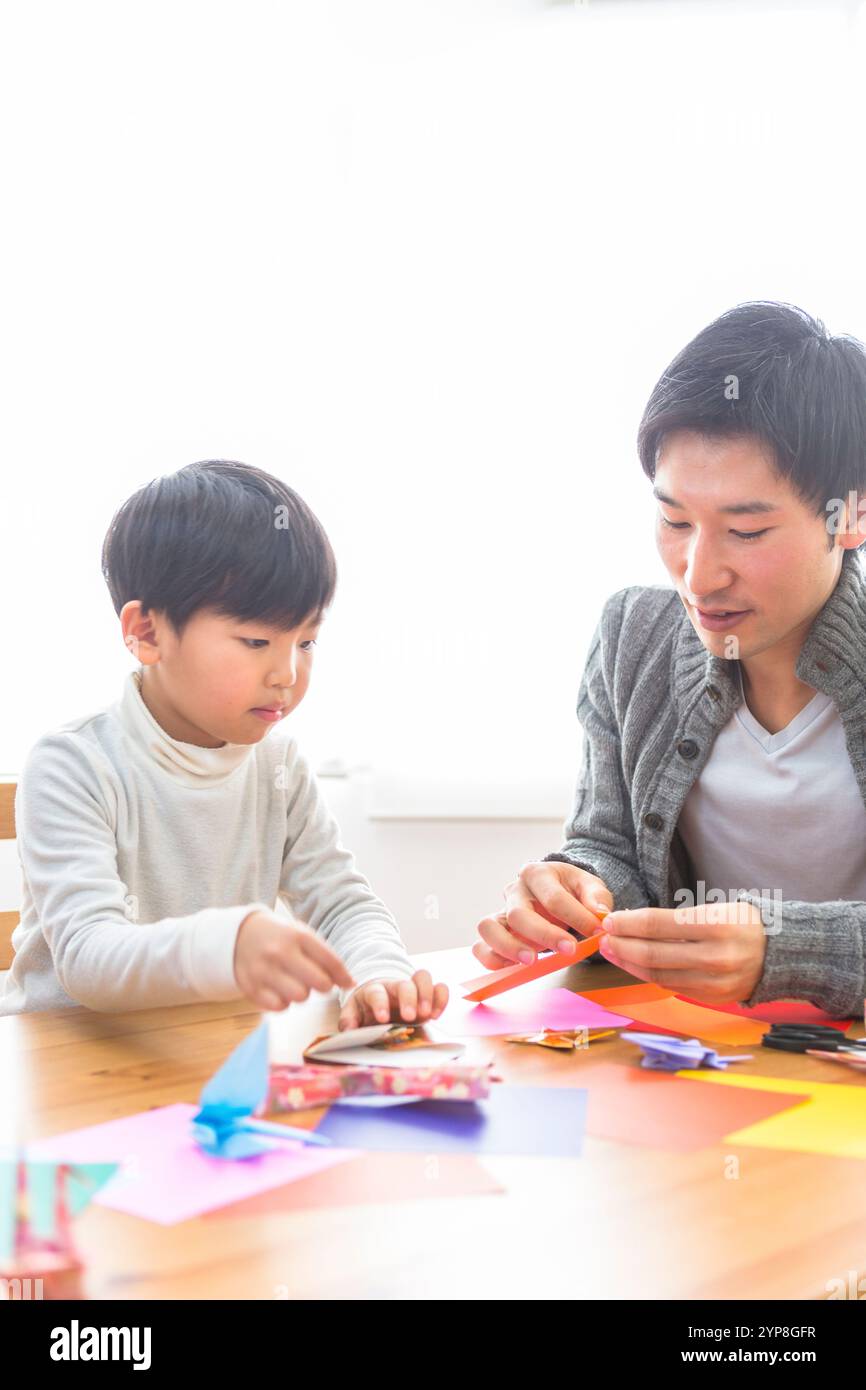 Family doing craft hi-res stock photography and images - Alamy