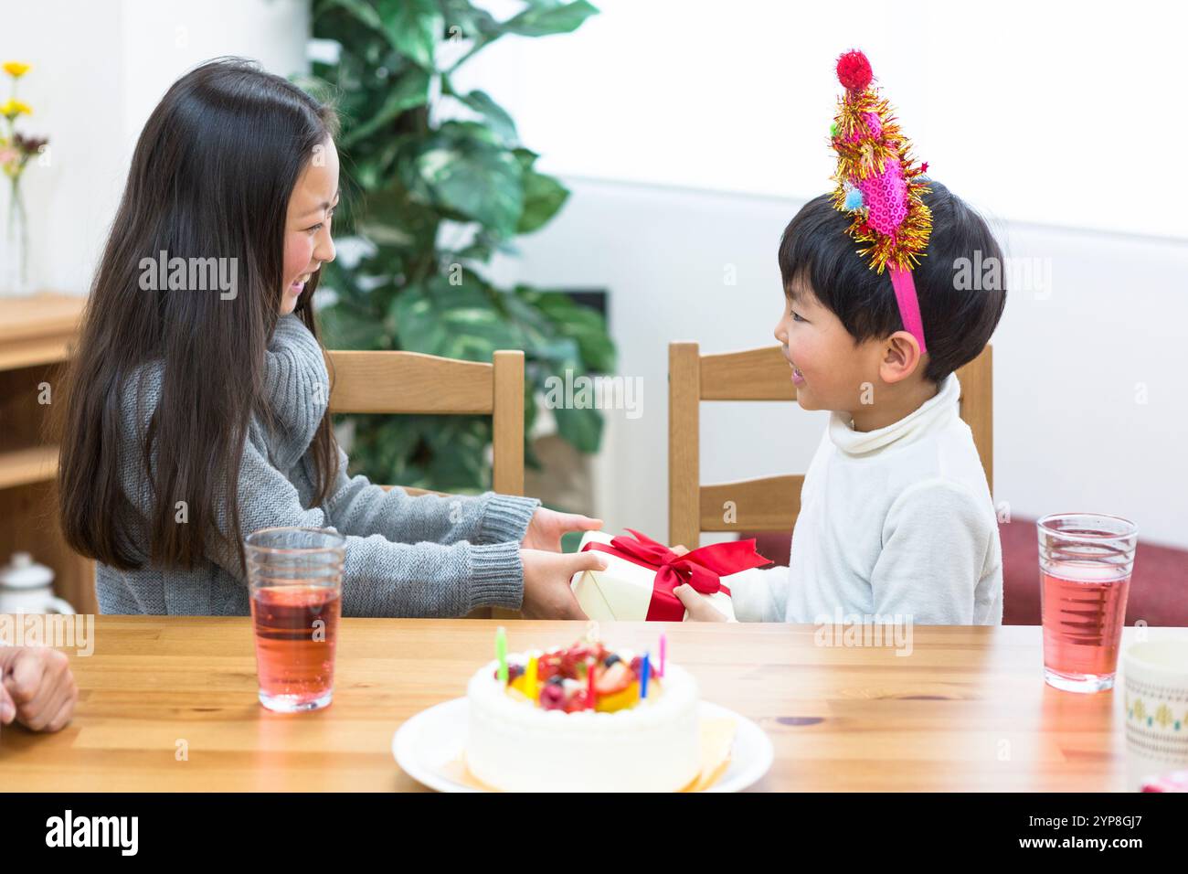 Brother and sister at birthday party hi-res stock photography and ...