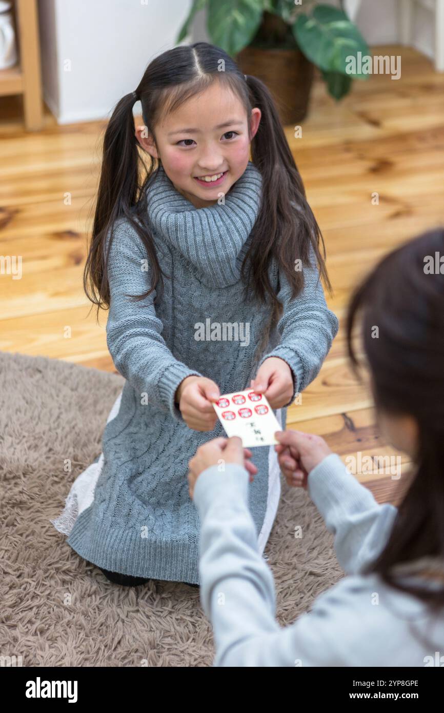 Children receiving gifts hi-res stock photography and images - Alamy