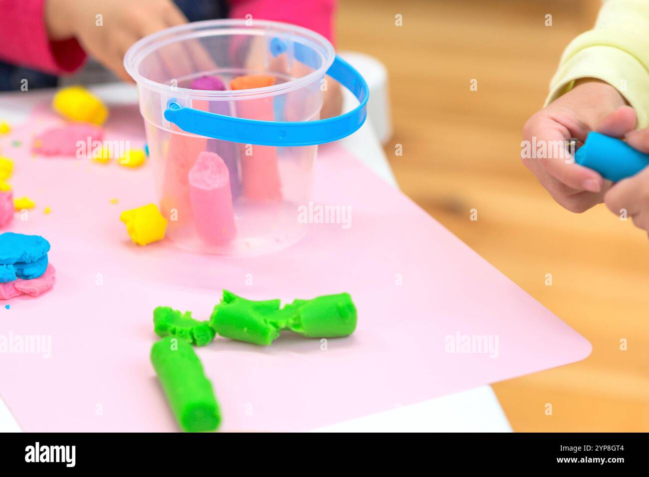 Children playing with clay Stock Photo - Alamy