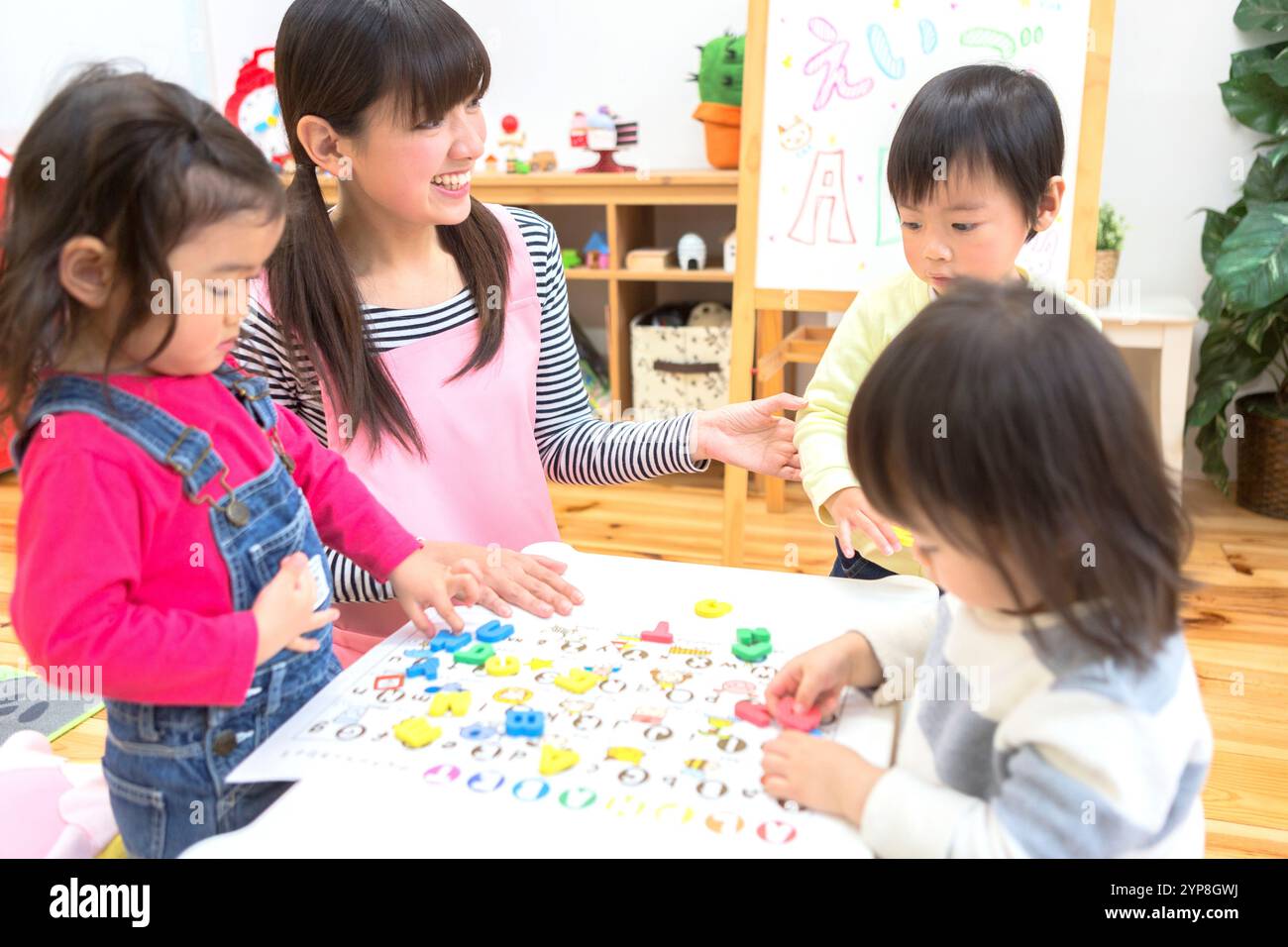 Children studying English Stock Photo - Alamy