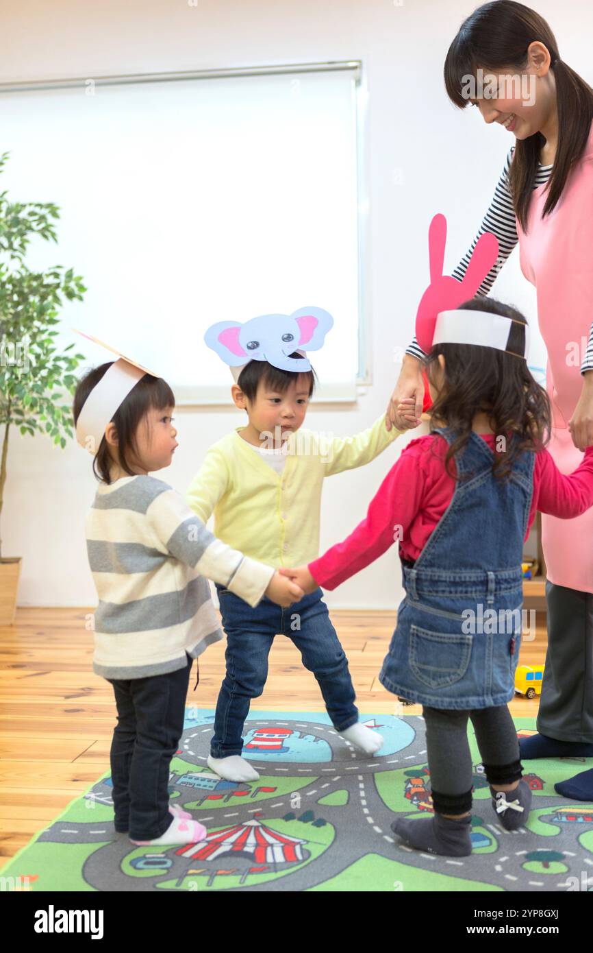 Children playing at play Stock Photo - Alamy