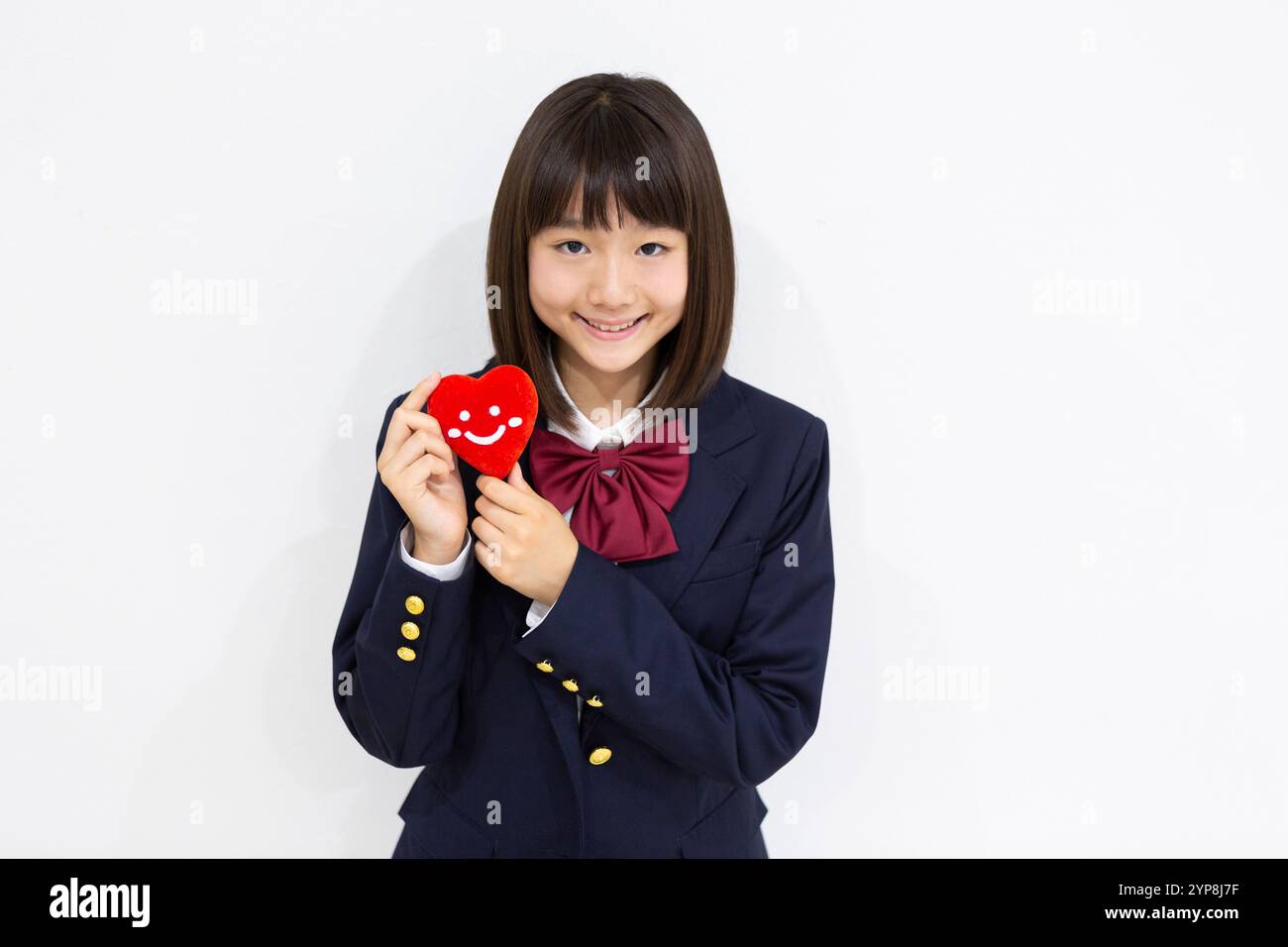Girl with heart Stock Photo - Alamy