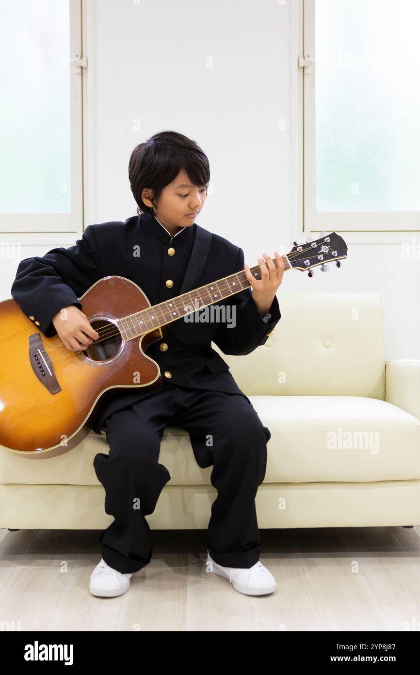 Music school guitar lesson hi-res stock photography and images - Alamy