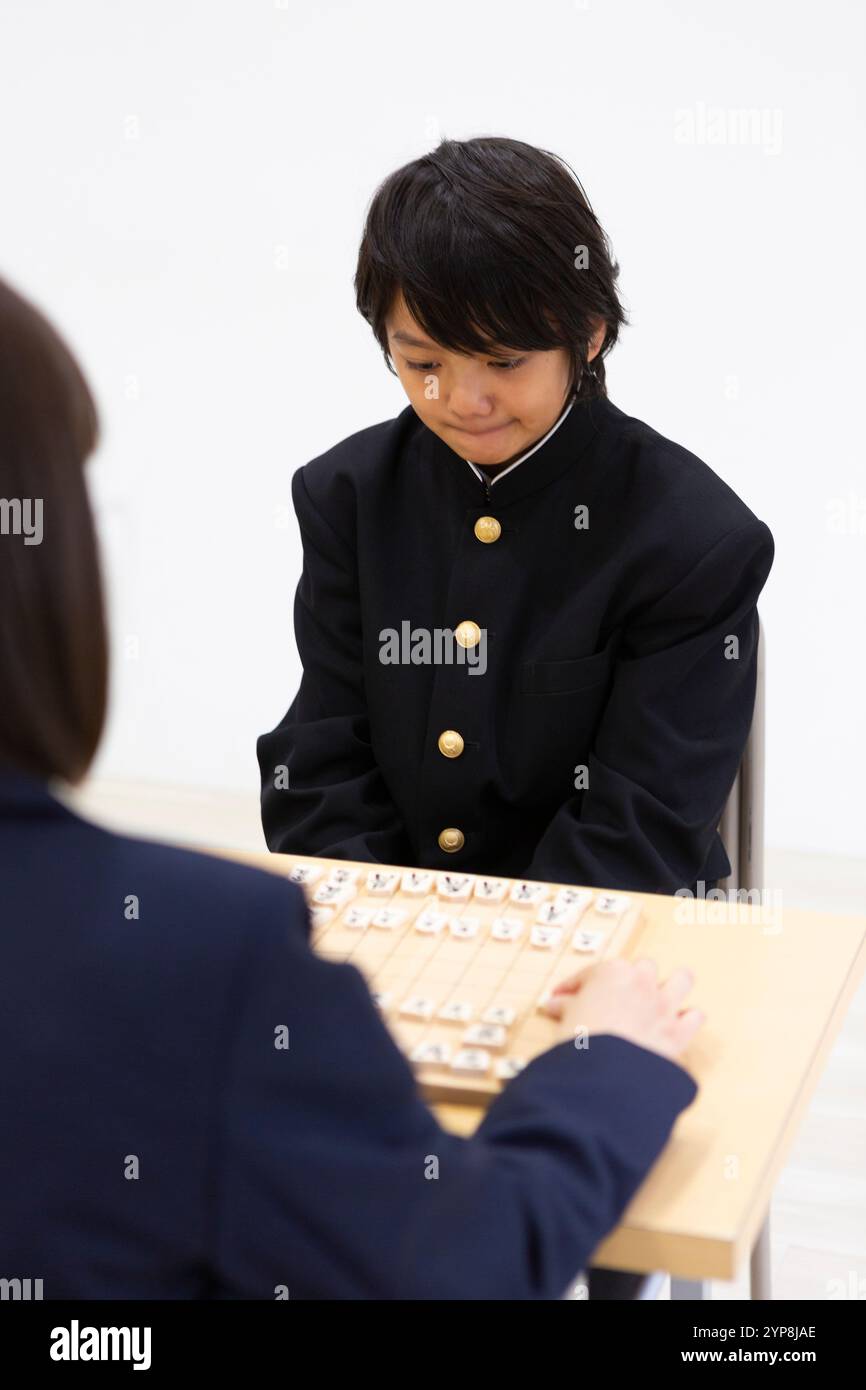 Two boys playing shogi hi-res stock photography and images - Alamy