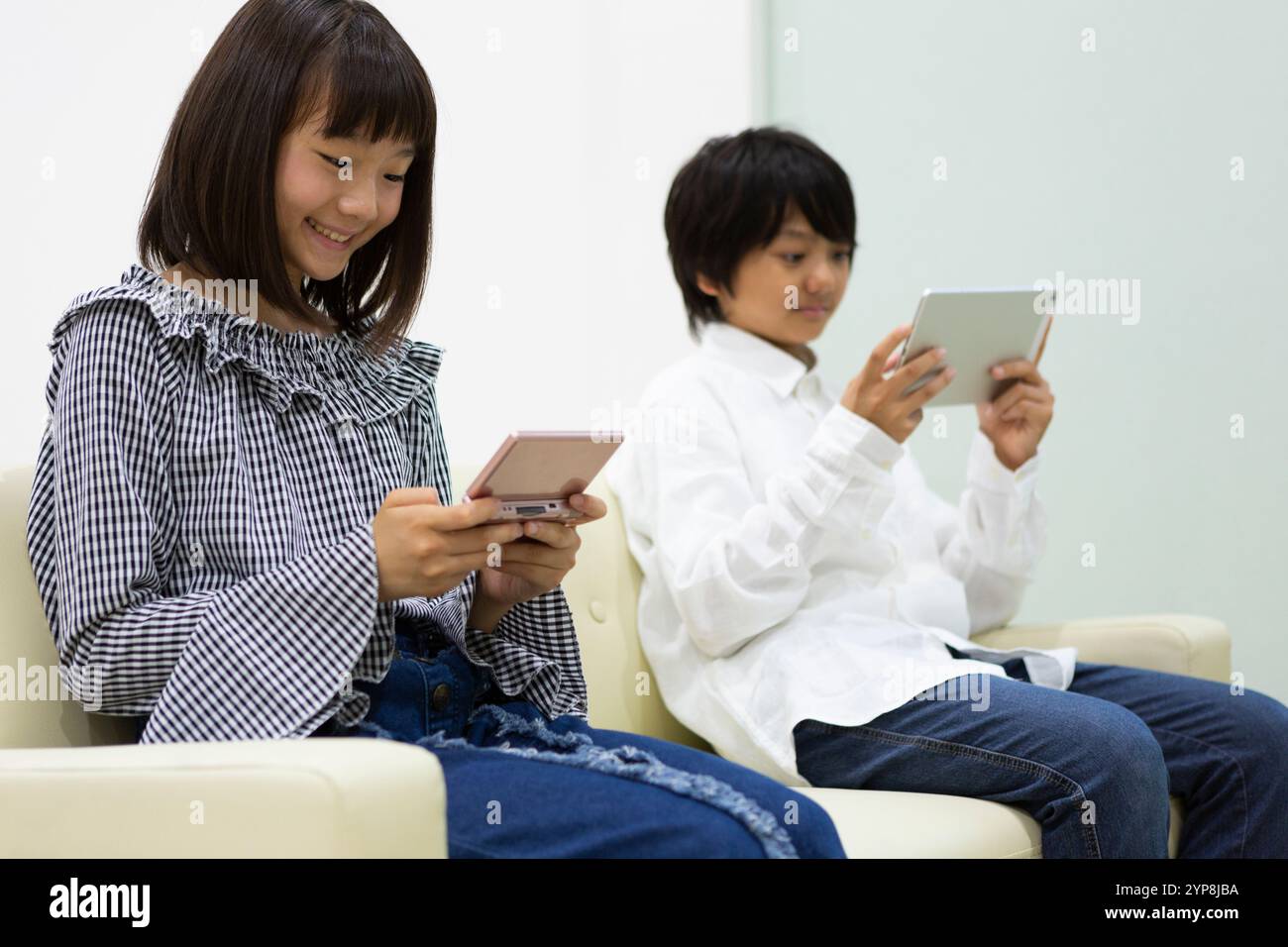 Junior high school students playing games Stock Photo - Alamy